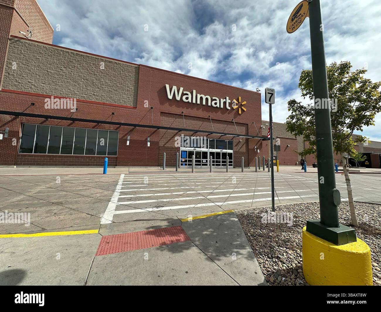 Storm clouds roil over a Walmart store Tuesday, May 13, 2025, in ...