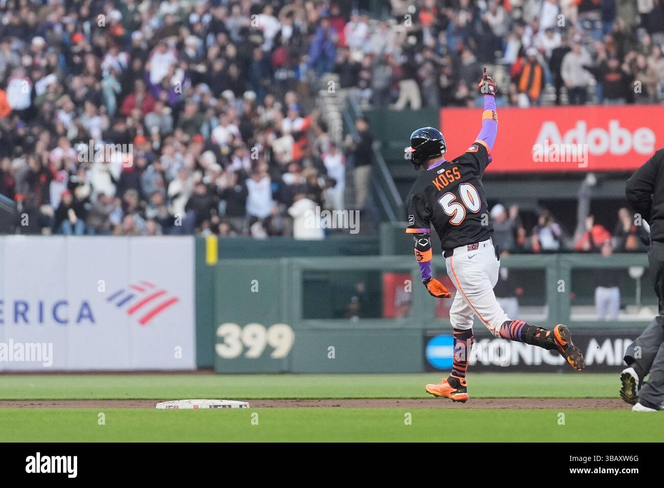 San Francisco Giants' Christian Koss (50) celebrates after hitting a ...
