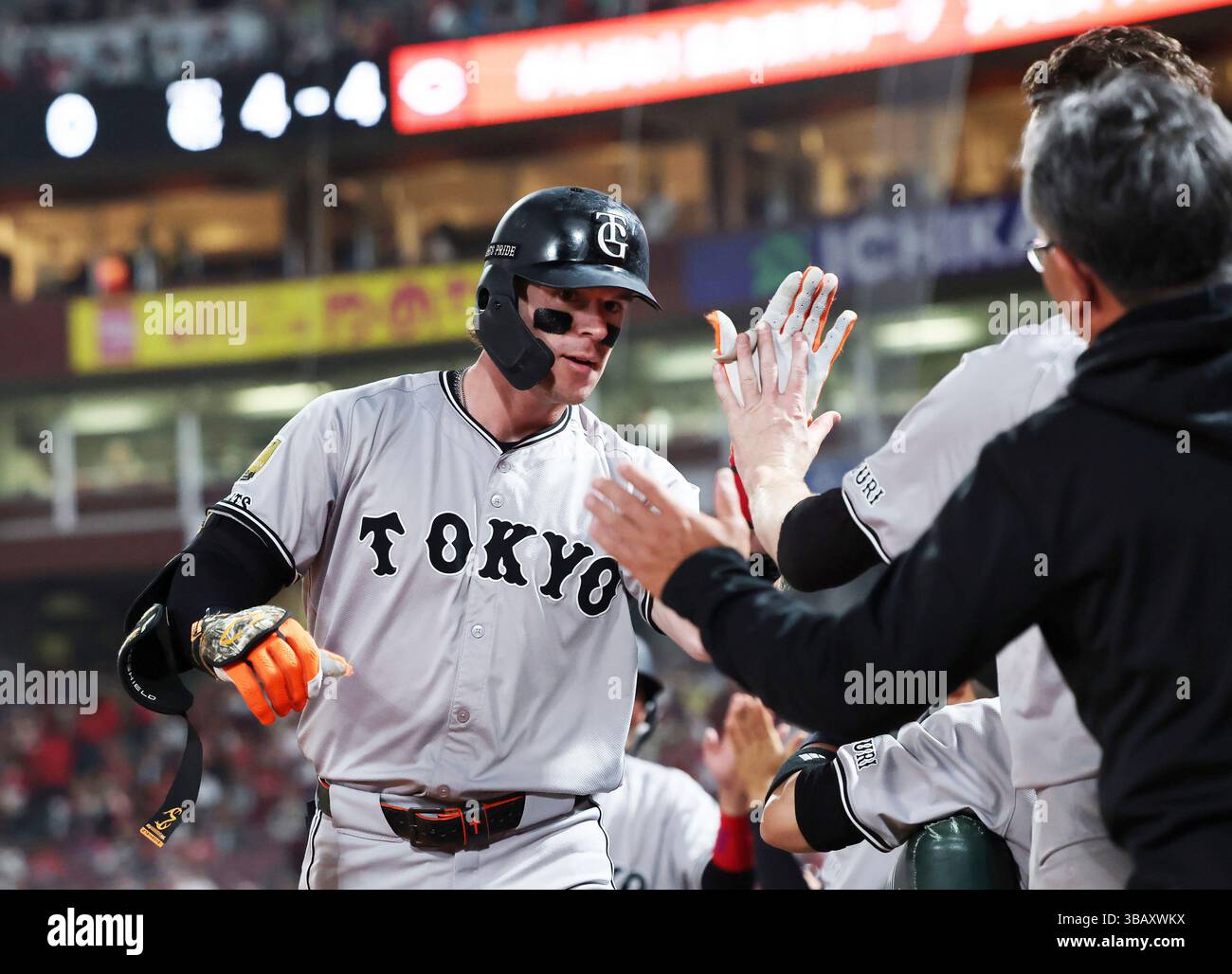Yomiuri Giants right fielder Trey Cabbage celebrates after a two-run ...