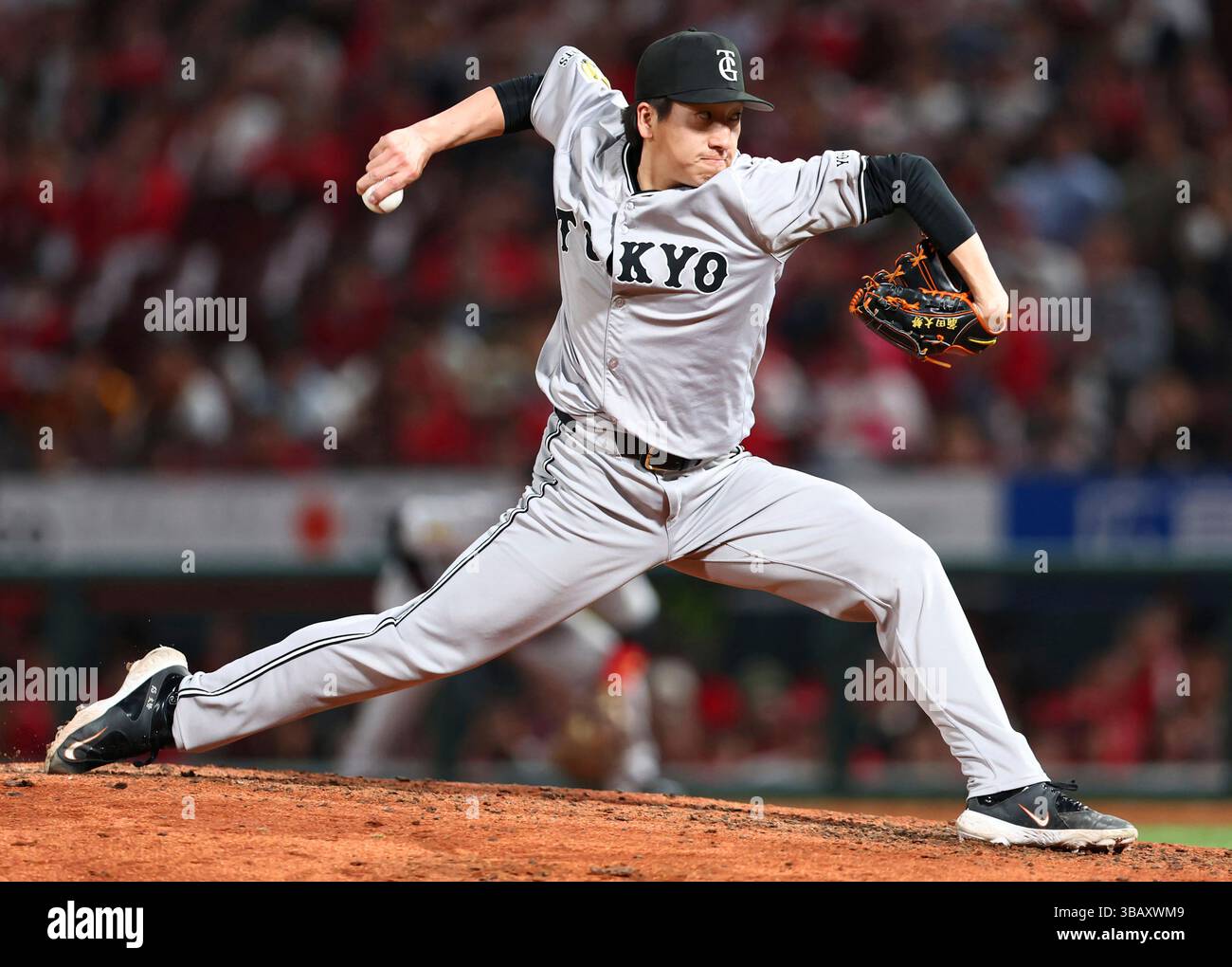 Yomiuri Giants setup pitcher Taisei OTA pitches in the ninth innning of ...