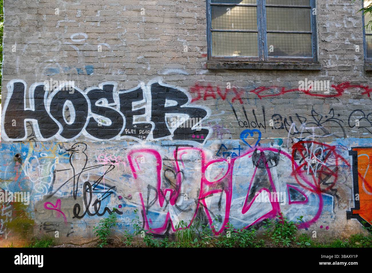 Graffiti on wall commercial hi-res stock photography and images - Alamy