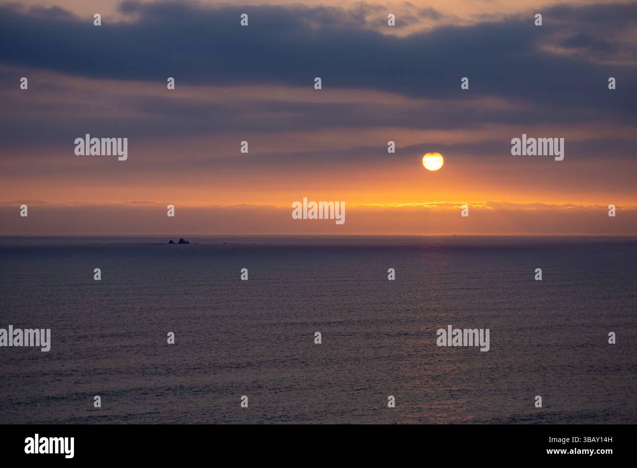 Sunset over the Pacific Ocean off the coast of Lima, Peru Stock Photo ...