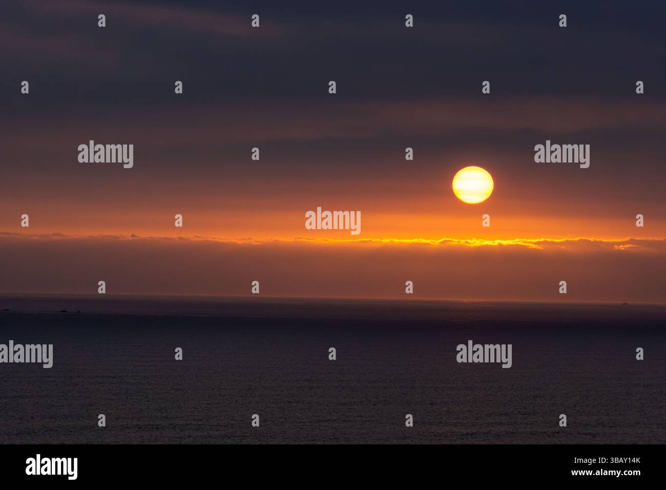 Sunset over the Pacific Ocean off the coast of Lima, Peru Stock Photo ...