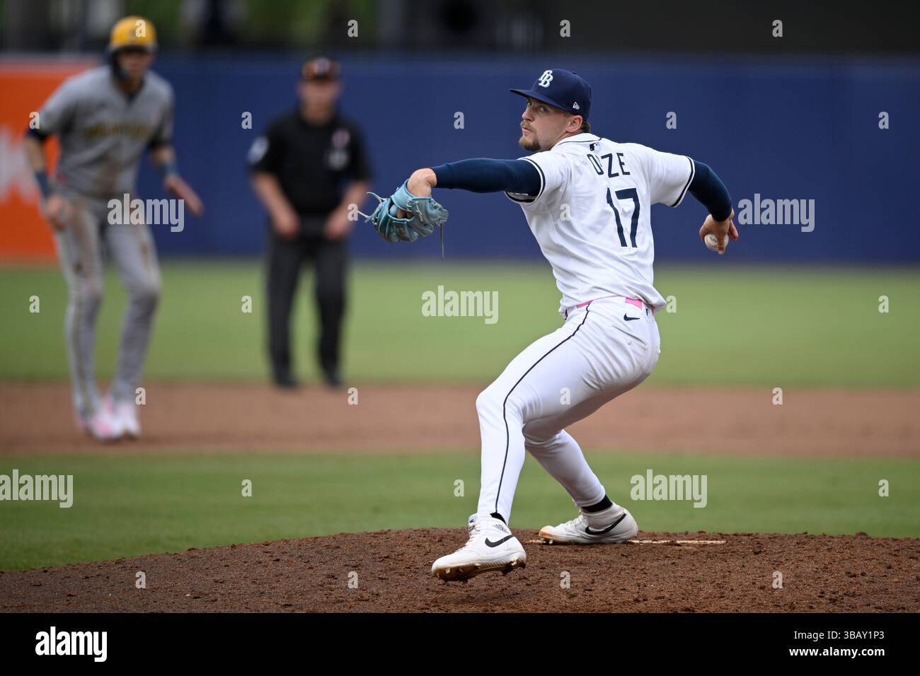 Tampa Bay Rays pitcher Eric Orze (17) throws to home plate during the ...