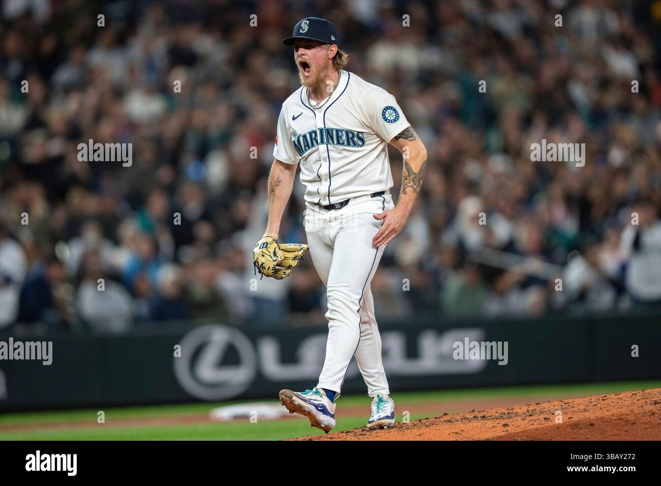 Seattle Mariners relief pitcher Gabe Speier reacts after a strikeout ...
