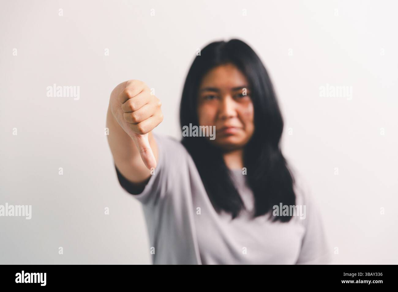 Asian girl expresses dislike, person express negative feeling, concept ...