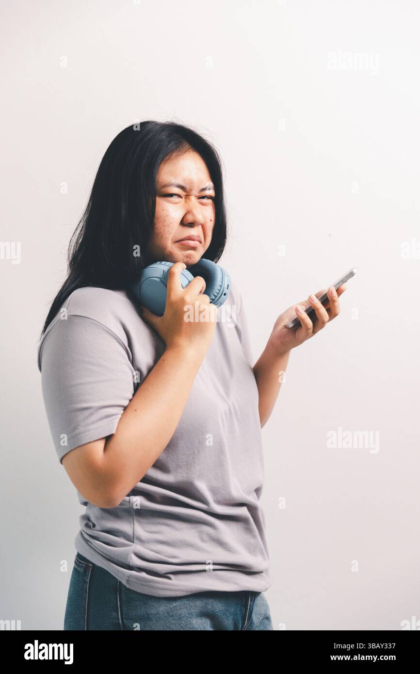 Asian girl expresses dislike, person express negative feeling, concept ...