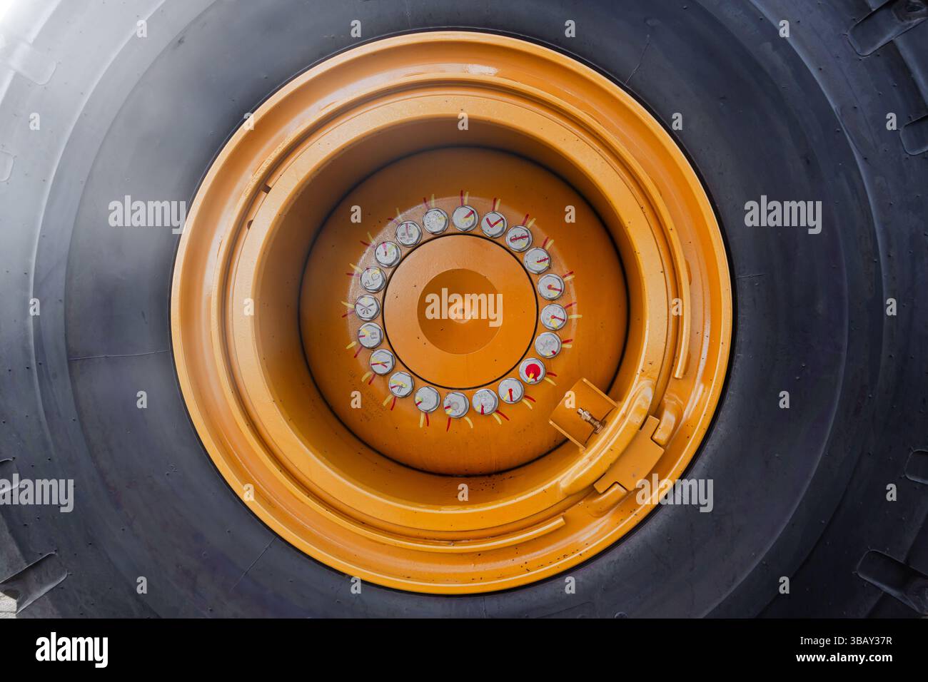 Wheel of heavy wheeled equipment. Excavator wheel with yellow disc ...