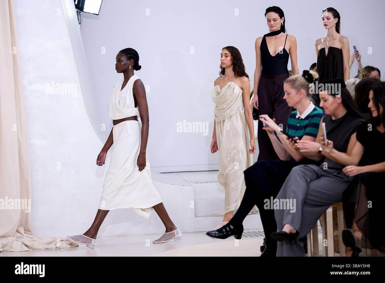 Sydney, Australia. 14th May, 2025. Models walk the runway during the ...