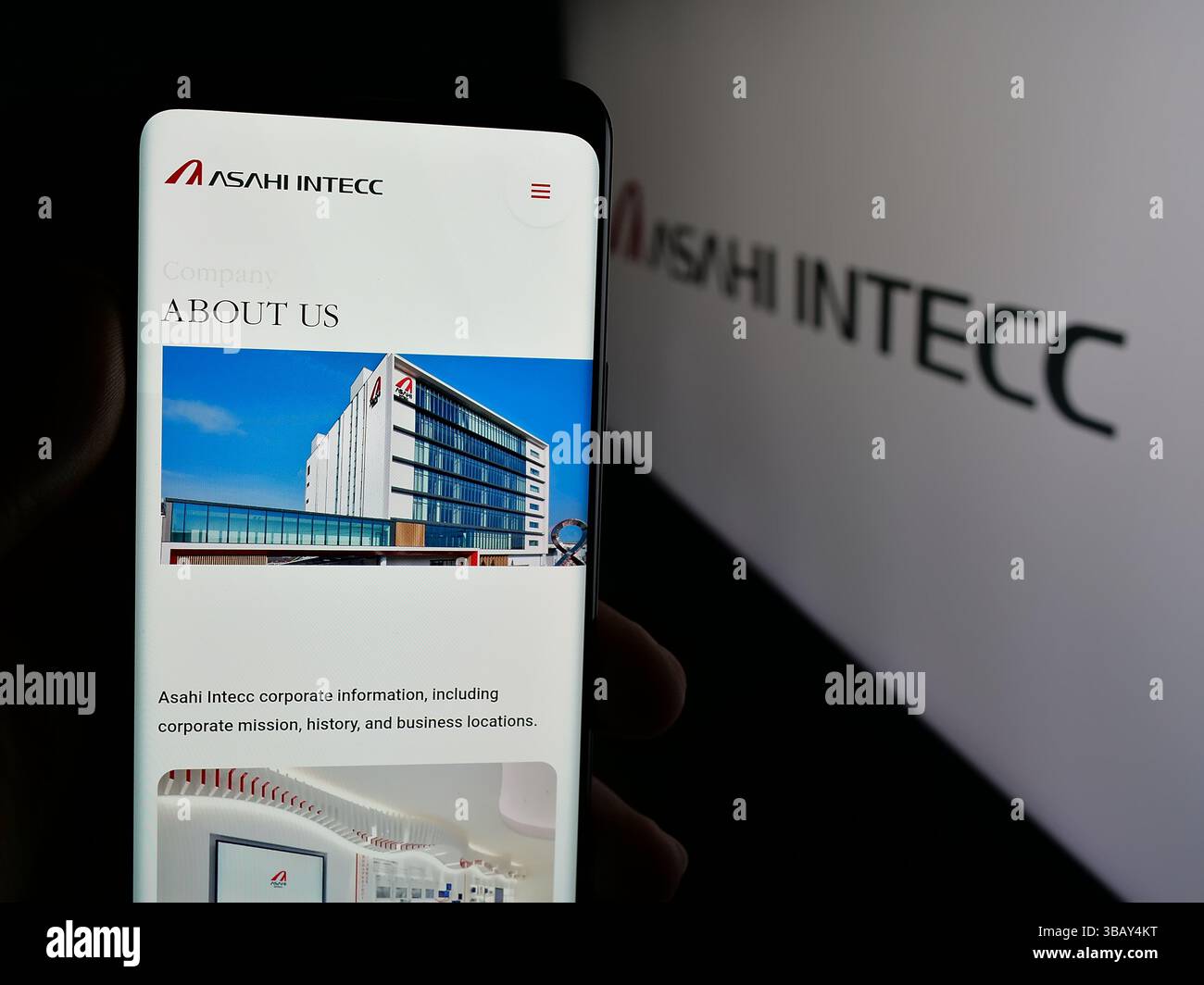 In this photo illustration, a person is holding a smartphone with the ...