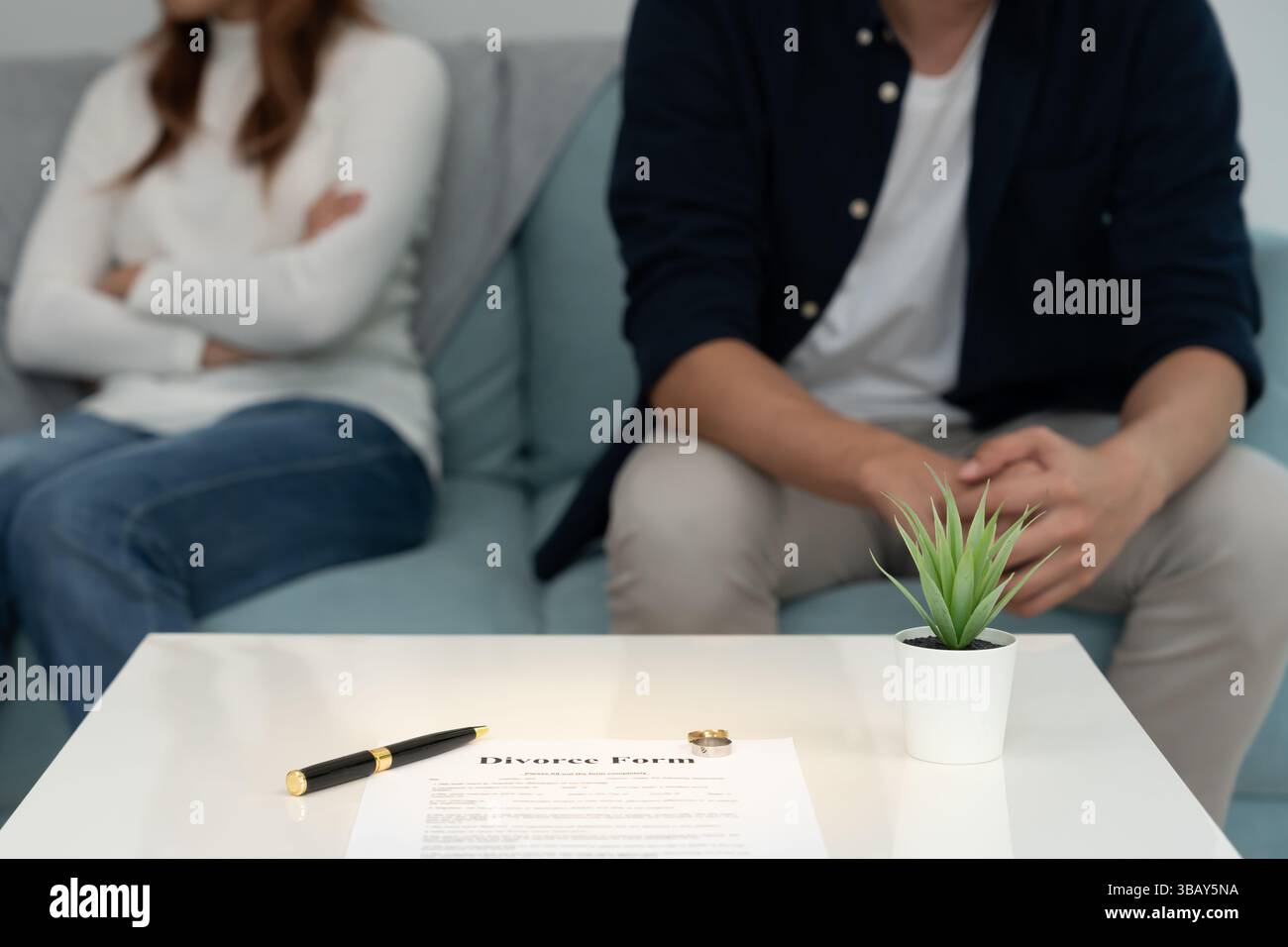 Divorce. Wife remove married ring and sign Divorce form. Couples ...