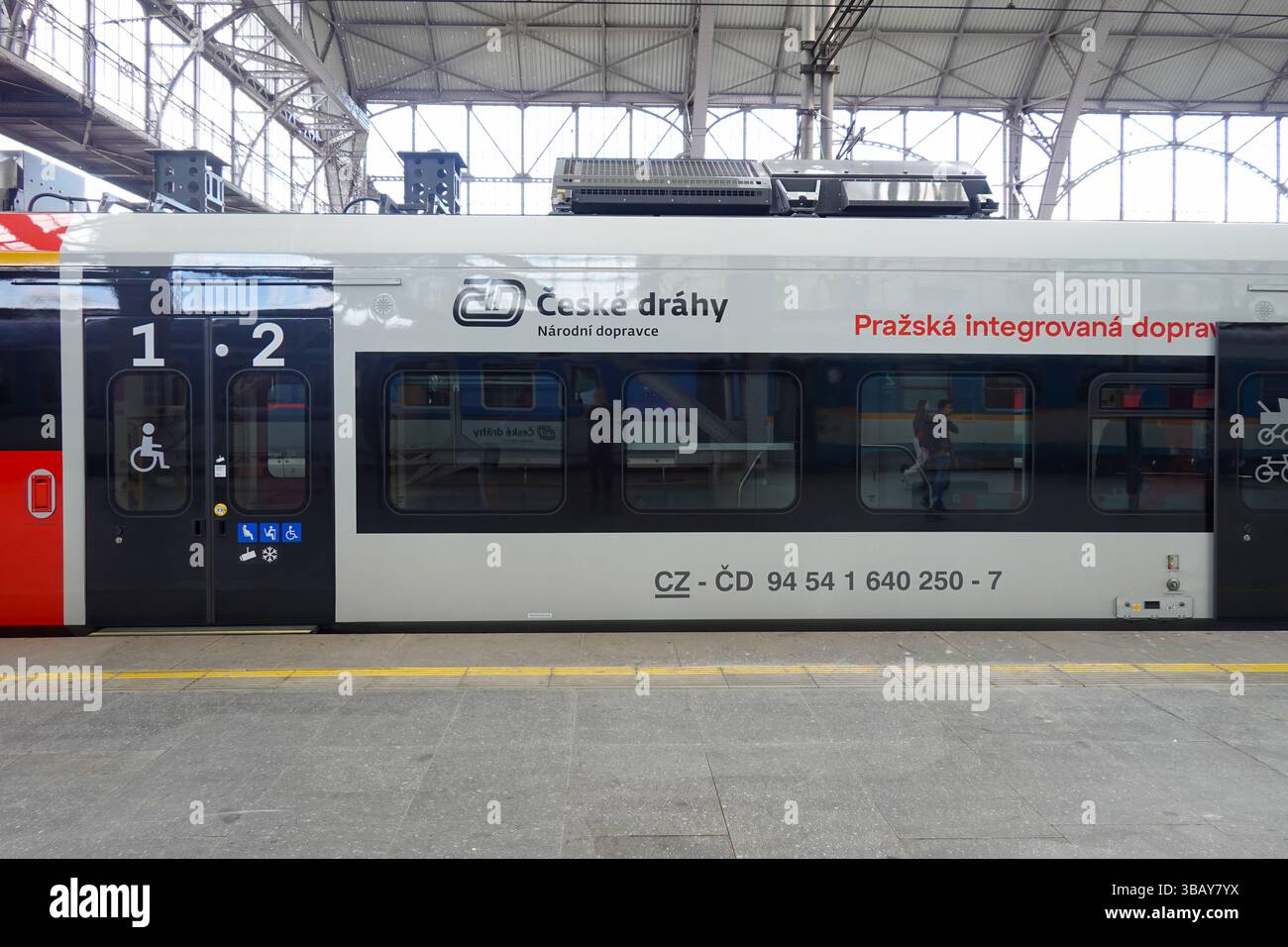 A modern regional train with national and integrated transport branding ...