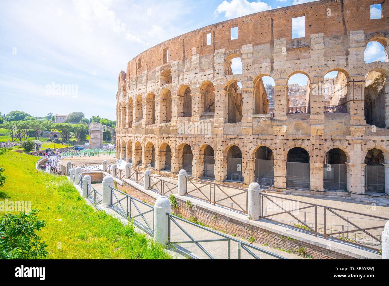 Tourists visit the Colosseum in Rome, Italy, a historic arena known for ...