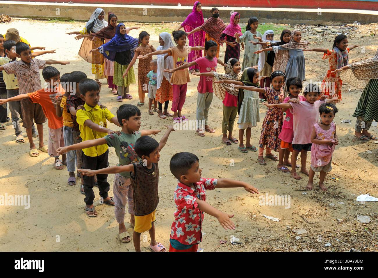 Classes For Homeless Children in Bangladesh Children are doing light ...