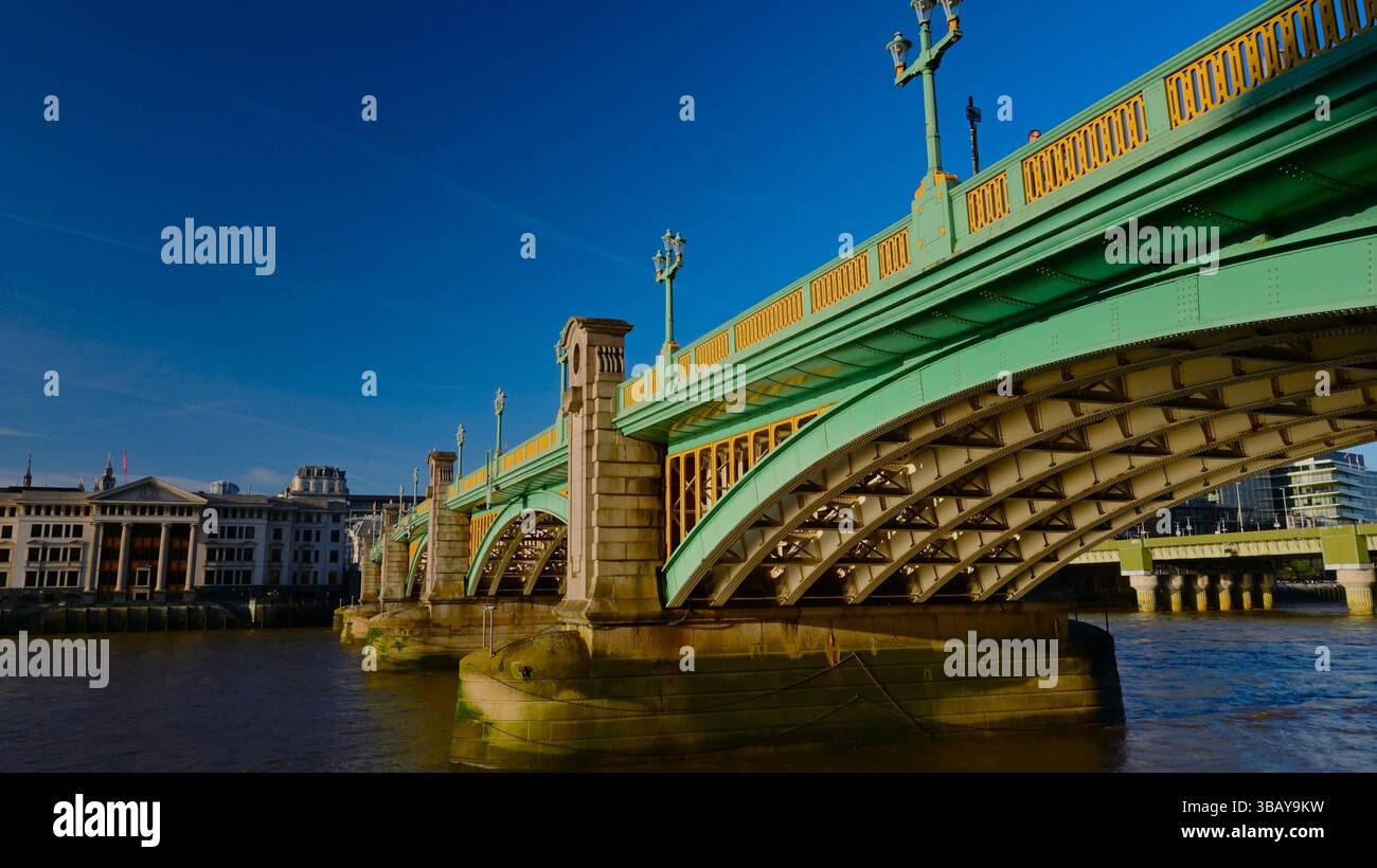 Southwark Bridge low angle image in the afternoon with bright colours ...