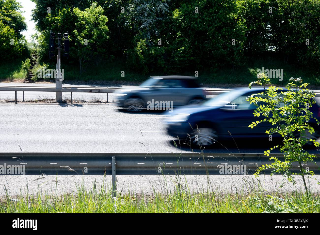 Cars at speed, blurred, on the M40 motorway, Warwickshire, UK Stock ...