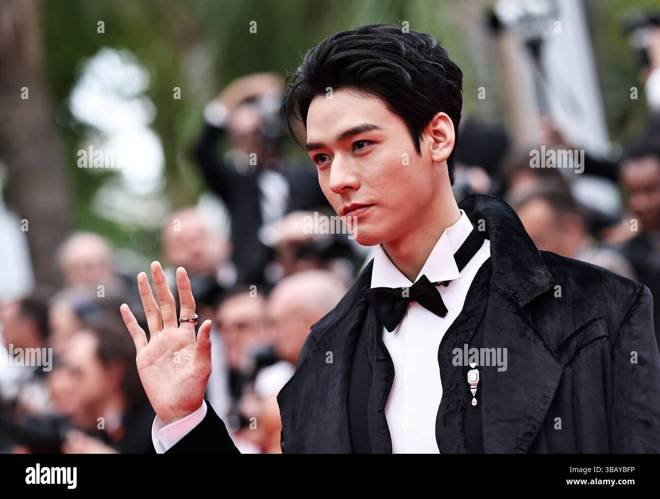 Cannes, France. 13th May, 2025. Chinese actor Gong Jun arrives on the red carpet for the opening ...