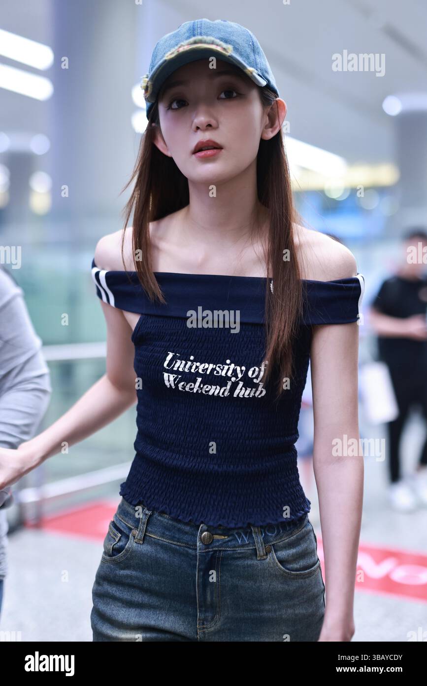 Chinese actress Luo Yutong appears at the airport in Shanghai, China ...