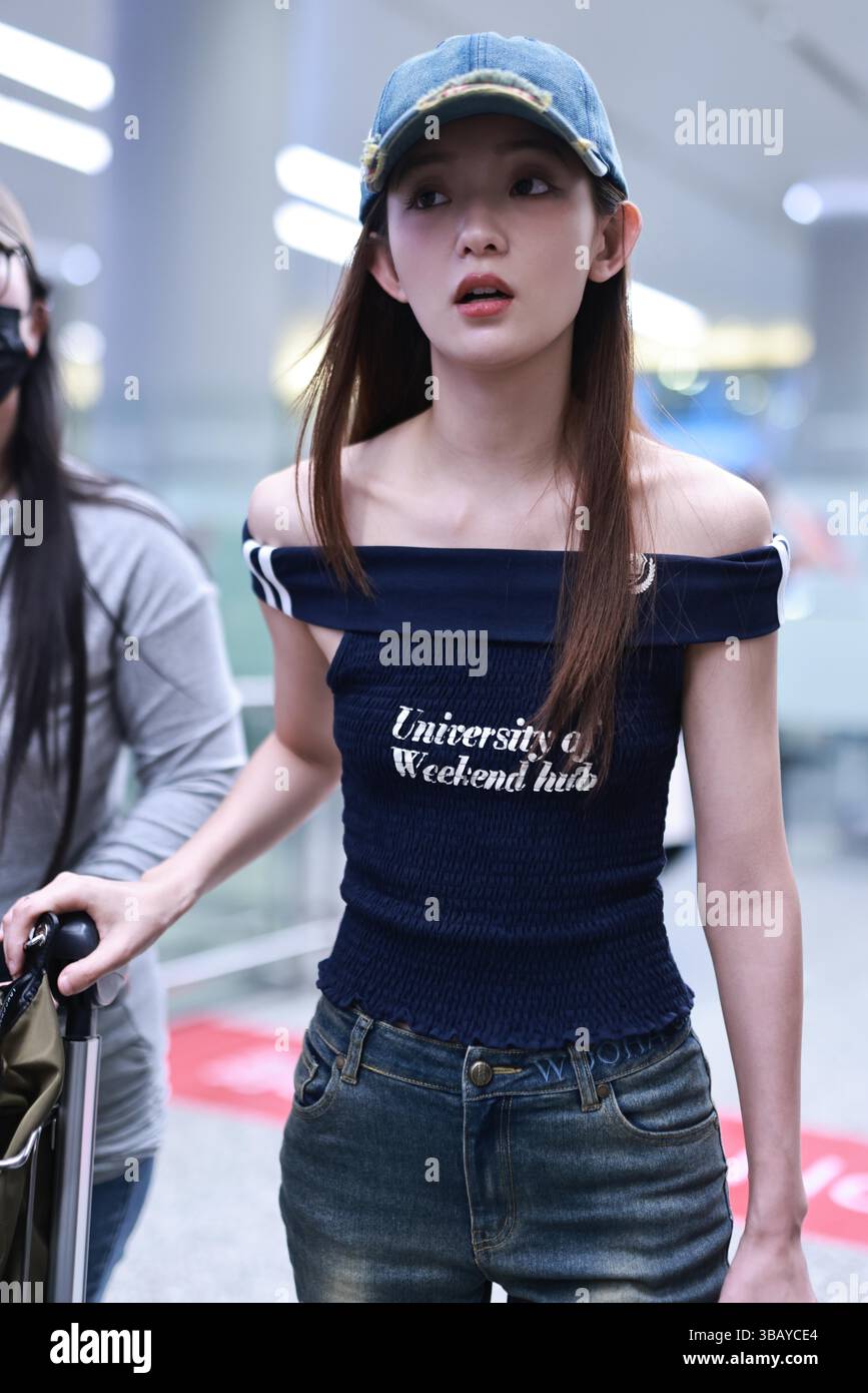 Chinese actress Luo Yutong appears at the airport in Shanghai, China ...