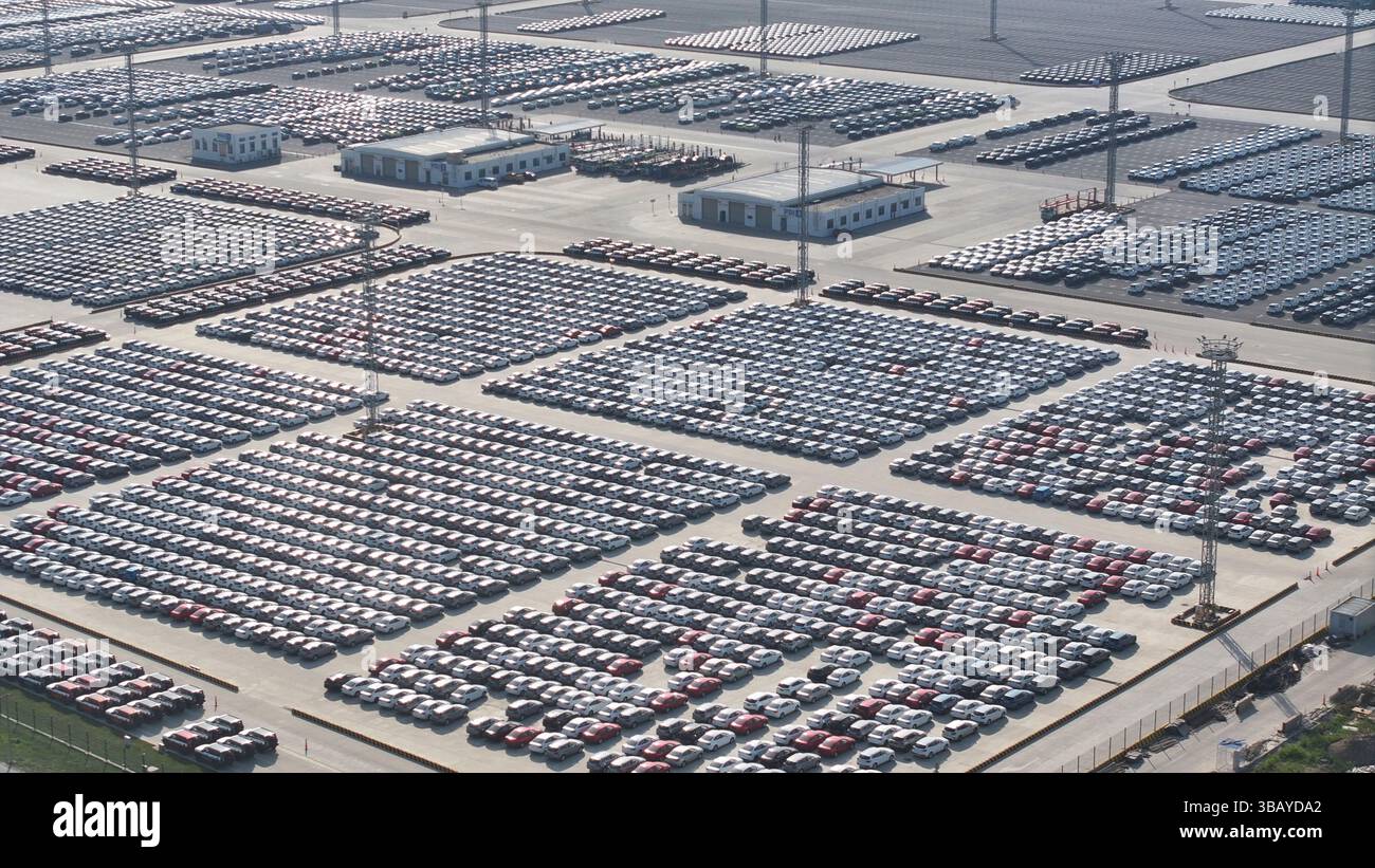 New vehicles for export wait for shipment in a port in Taicang city in ...