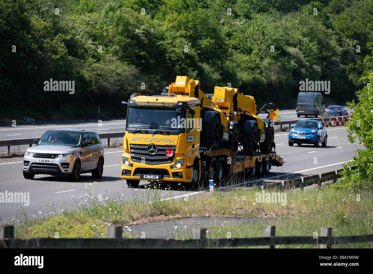Brit European lorry carrying new JCB vehicles, M40 motorway ...