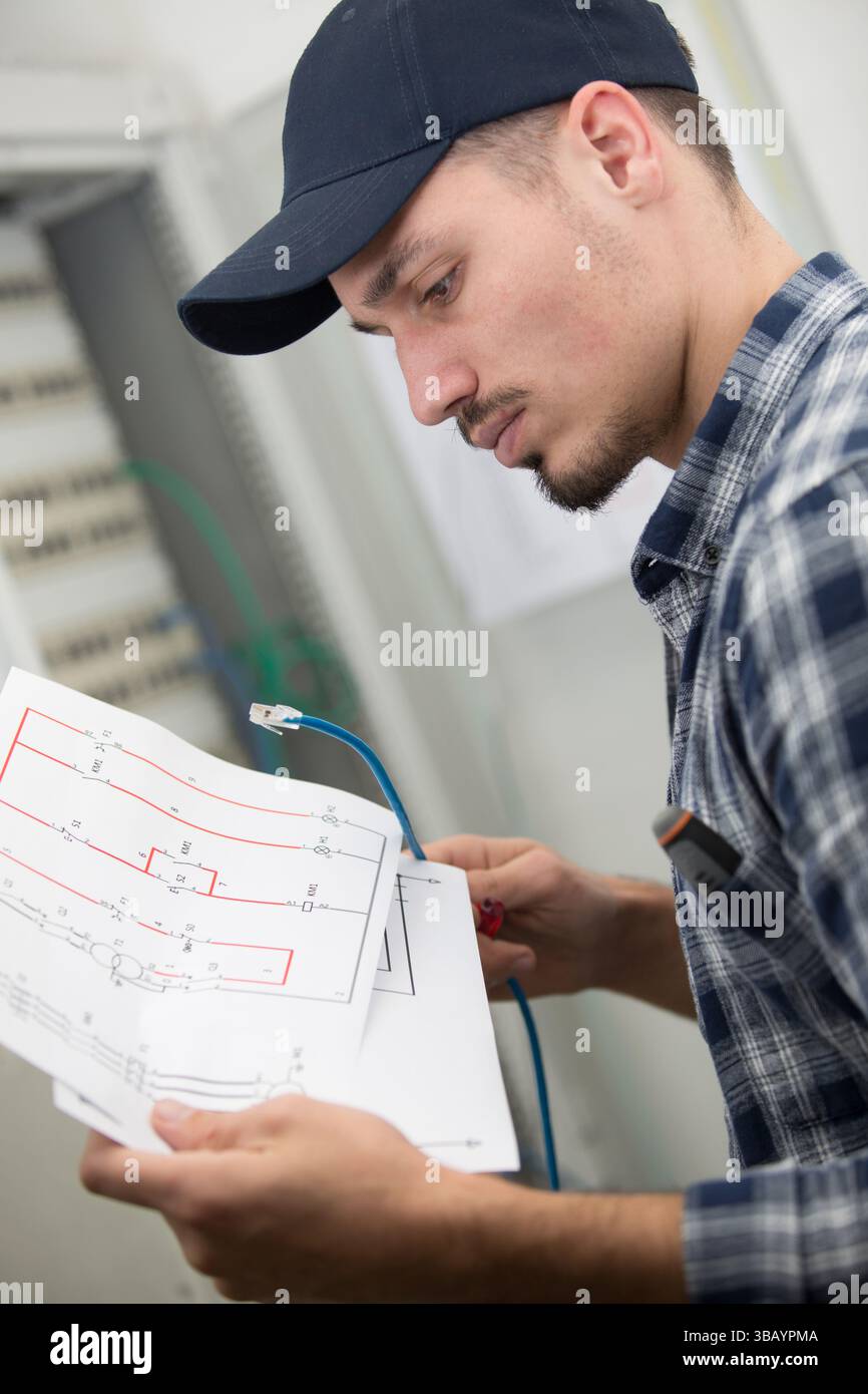 technician is checking a power plan Stock Photo - Alamy