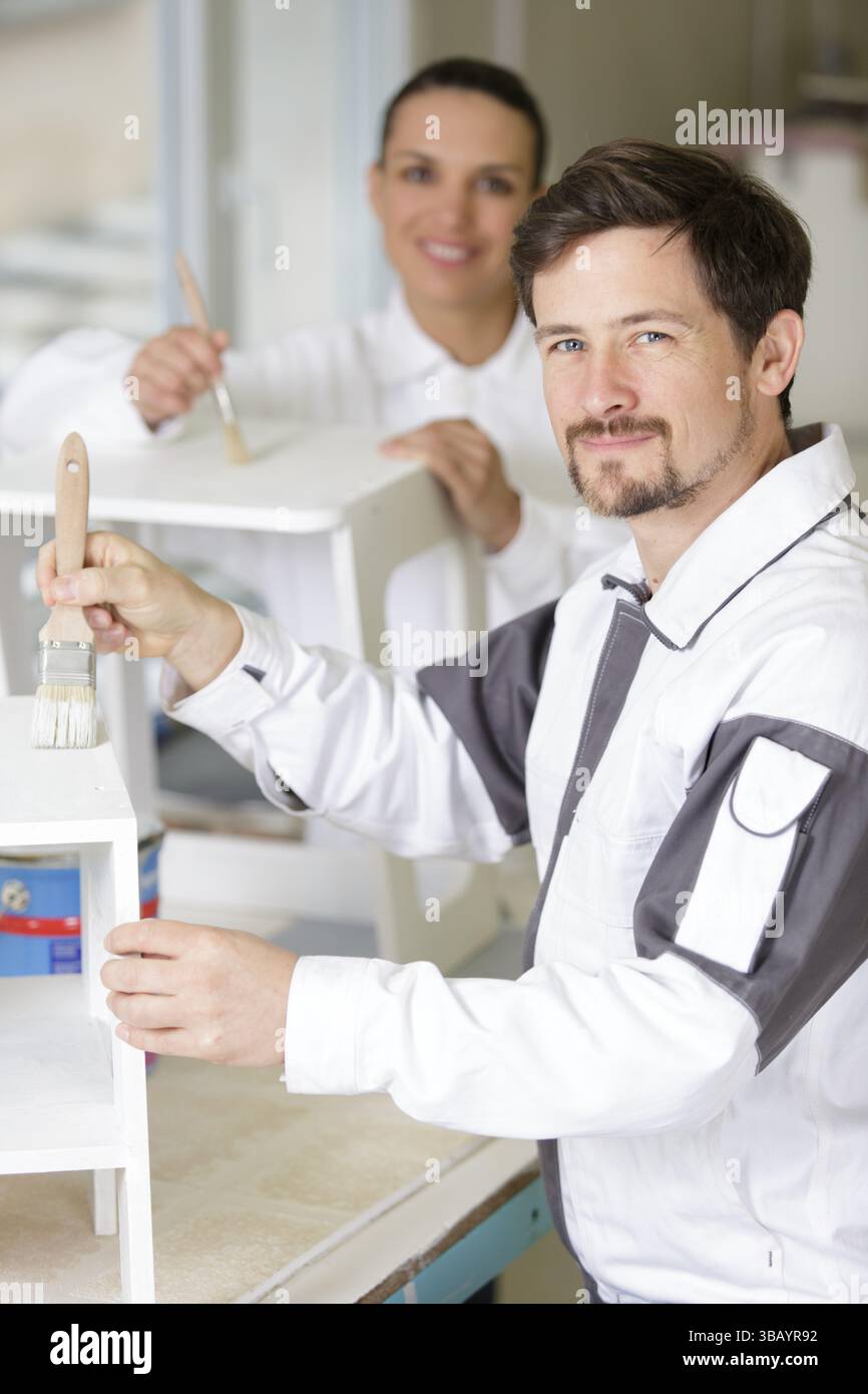 Young couple furniture restoration hi-res stock photography and images ...