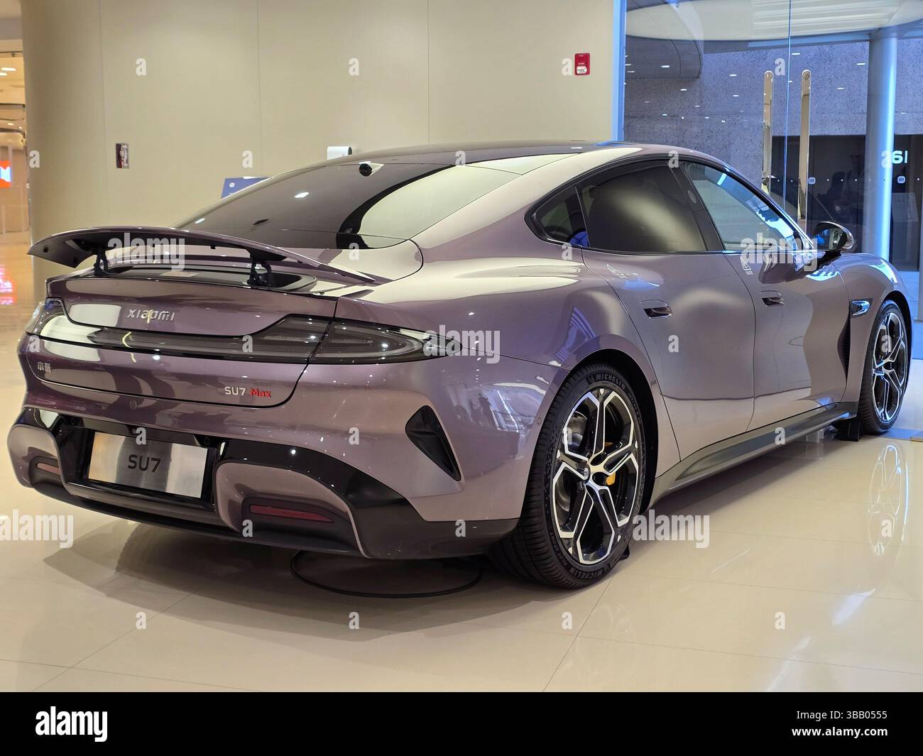 Backside view of the metallic purple Xiaomi SU7 Max electric sports car ...
