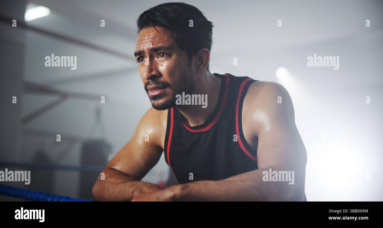 Man, boxer and sweating fatigue in gym, intense and recovery with ...