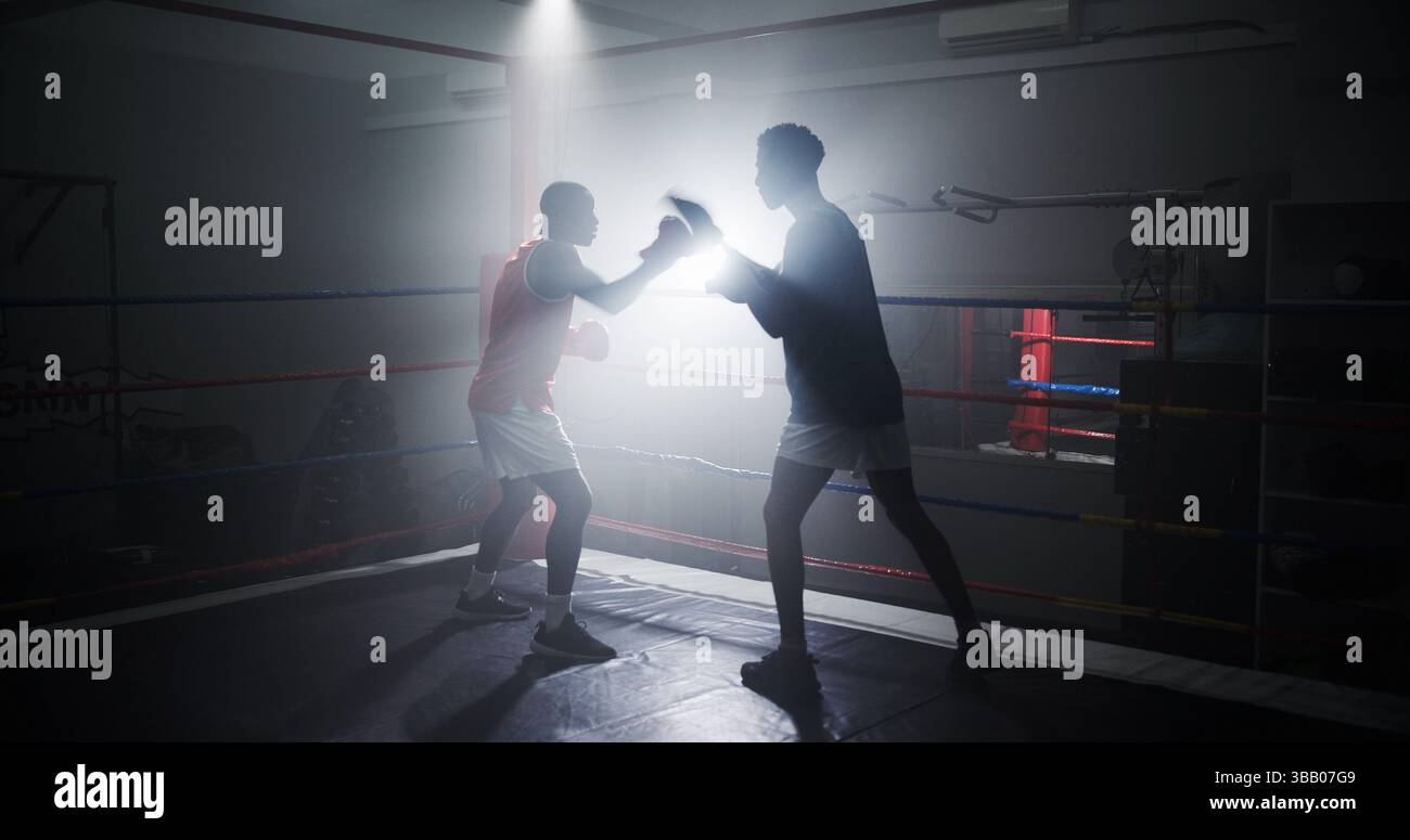 Boxing, team and workout with men in ring for sparring practice ...