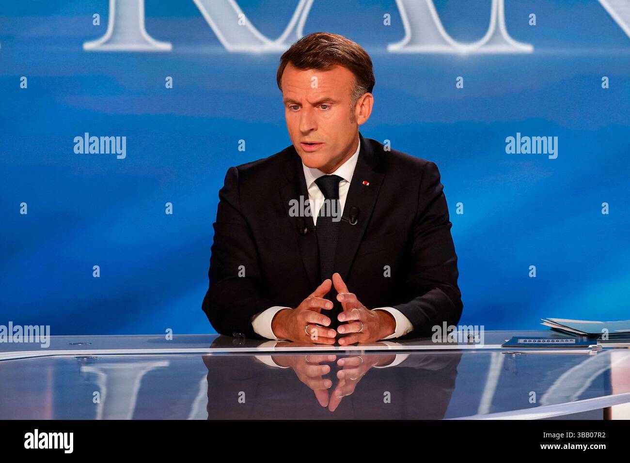 French President Emmanuel Macron takes part in a special program of the ...