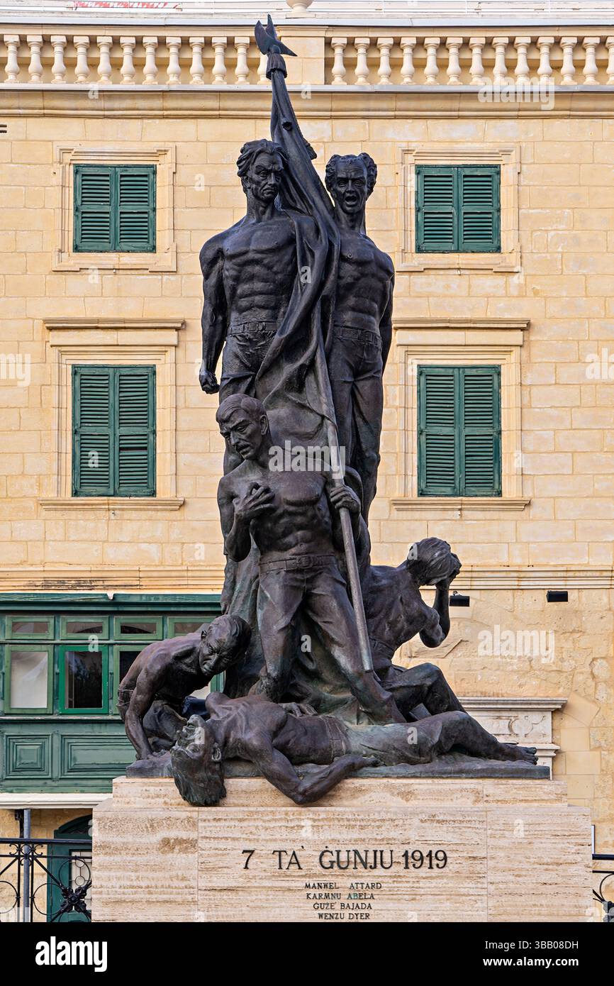 Bronze memorial stands tall in urban square marking 1919 uprising ...