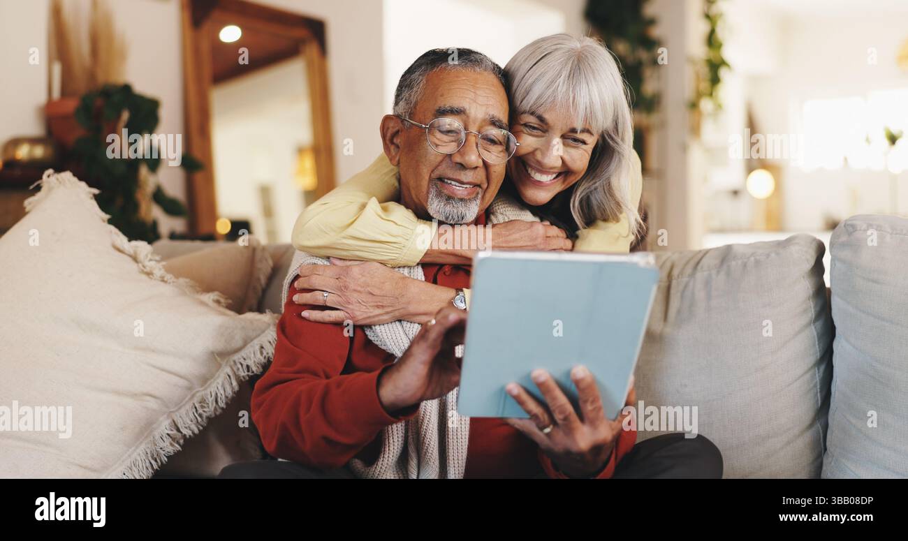 Home, tablet and senior couple with hug, relax and conversation with ...