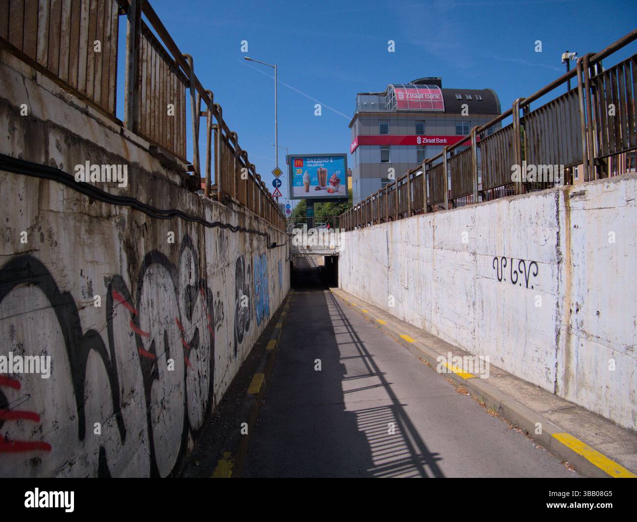 Urban Underpass Pathway with Graffiti and Building in Background, Sofia ...