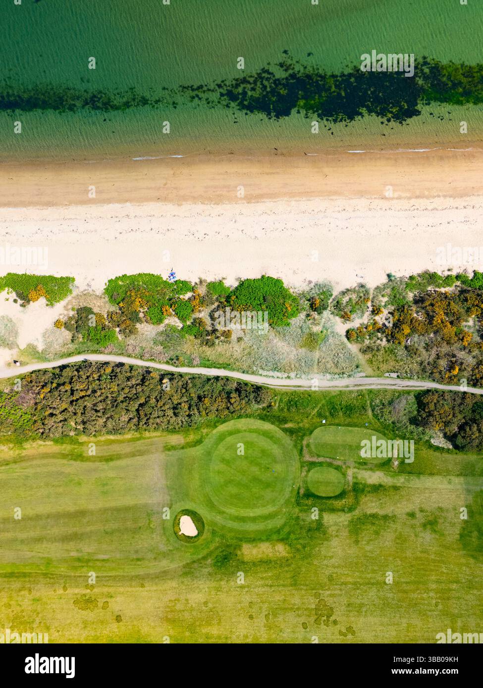 Aerial view from drone of village of Brodick Golf course and Cladach ...