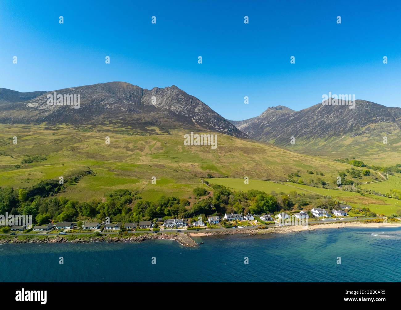 Aerial view from drone of village and beach at Sannox , Isle of Arran ...