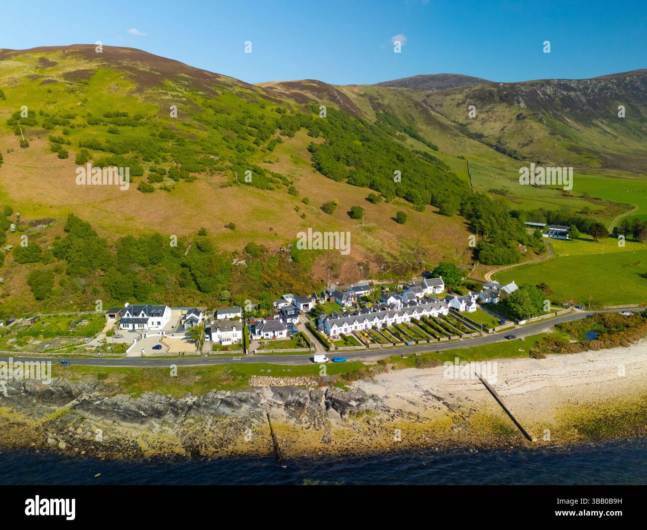 Aerial view from drone of village at Catacol, Isle of Arran, North ...