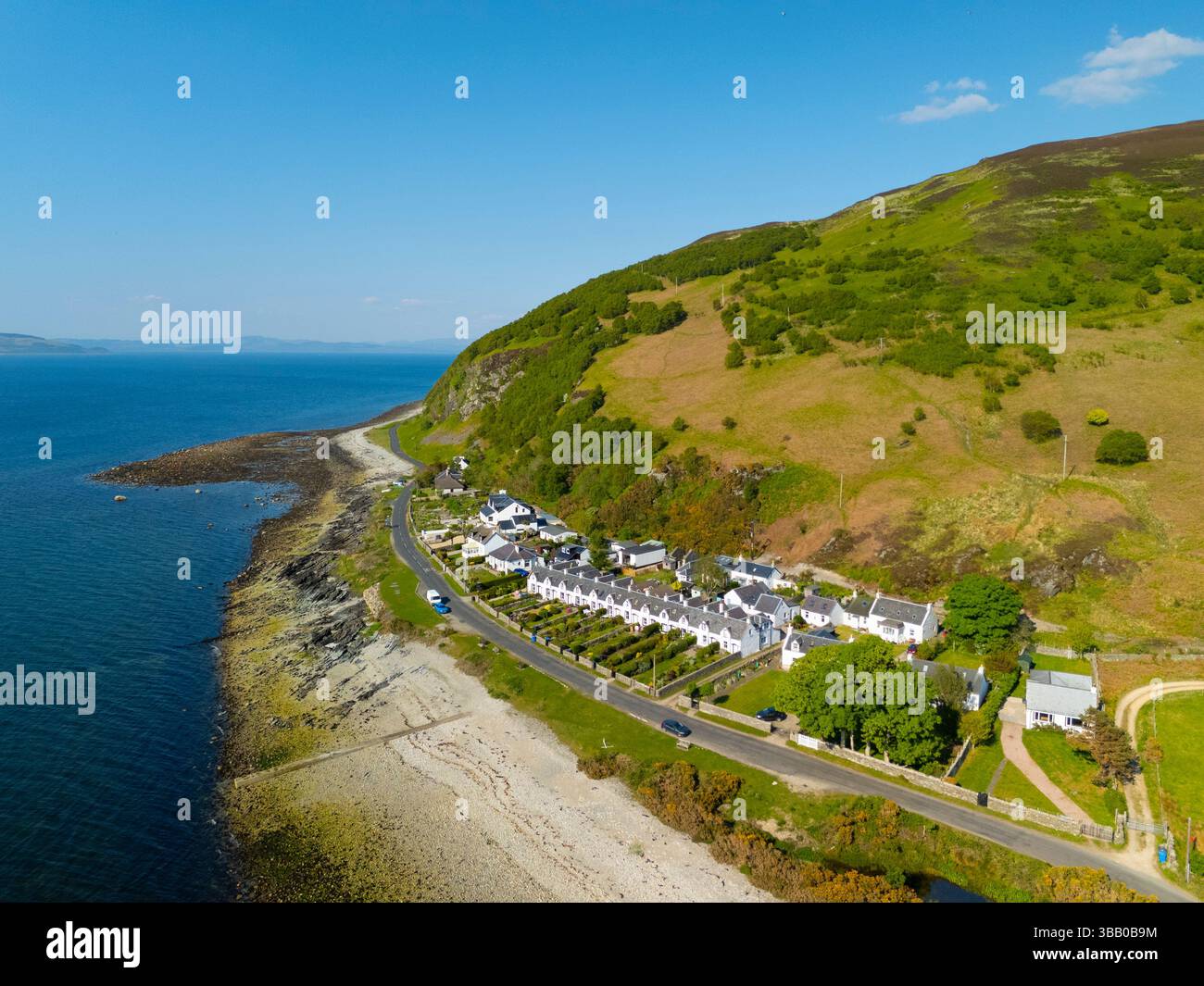 Aerial view from drone of village at Catacol, Isle of Arran, North ...