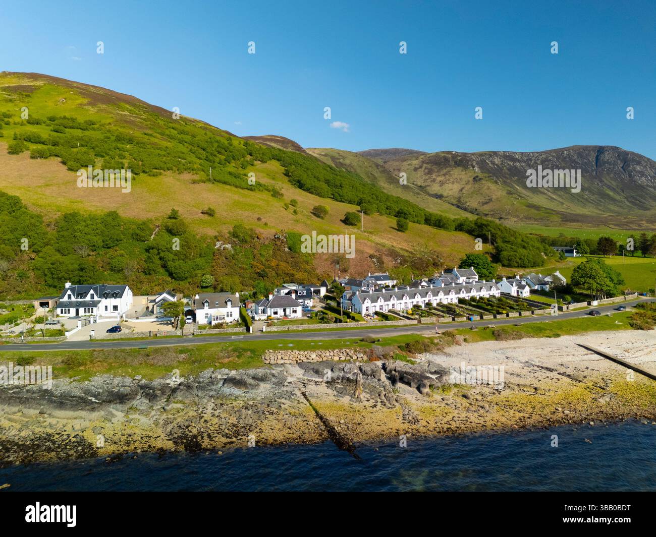 Aerial view from drone of village at Catacol, Isle of Arran, North ...
