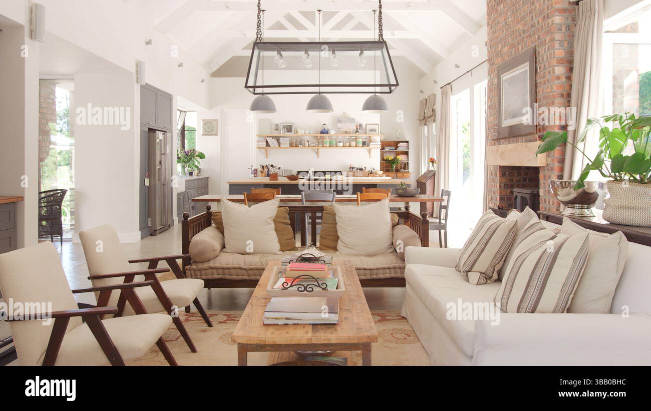 Interior Of Stylish Modern Open Plan Home With Kitchen Dining Room And ...