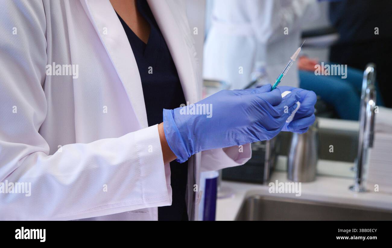 Close Up Of Beautician Or Doctor Holding Syringe Before Giving Patient ...