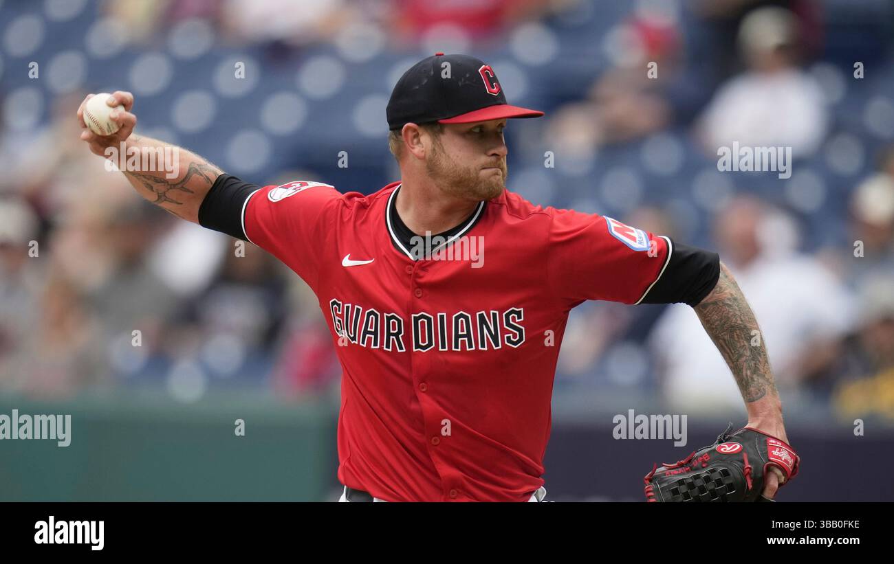 Cleveland Guardians starting pitcher Ben Lively (39) throws during a ...