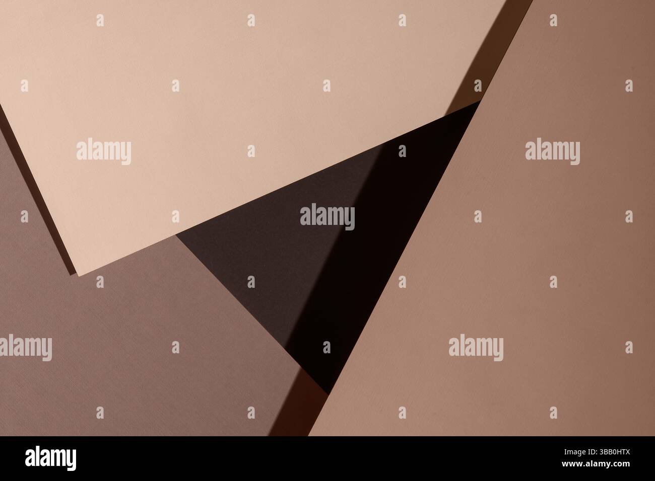 The arrangement showcases various layers of paper in shades of beige ...