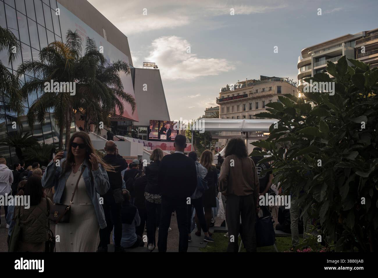 Cannas, France. 13th May, 2025. Tourists walk near, the venue for the ...