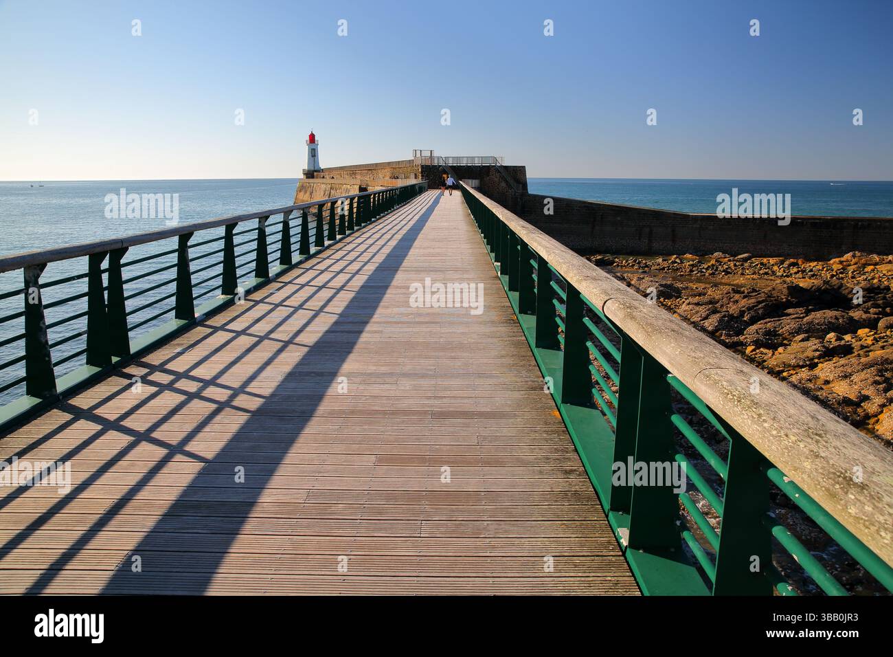 The jetty leading to the lighthouse in Les Sables d'Olonne, Vendee ...