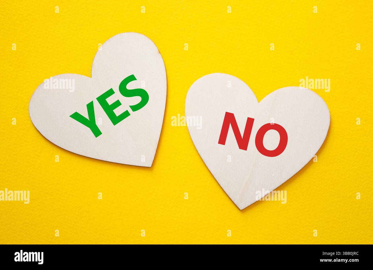 Yes or No symbol. Concept word Yes or No on wooden hearts. Beautiful ...