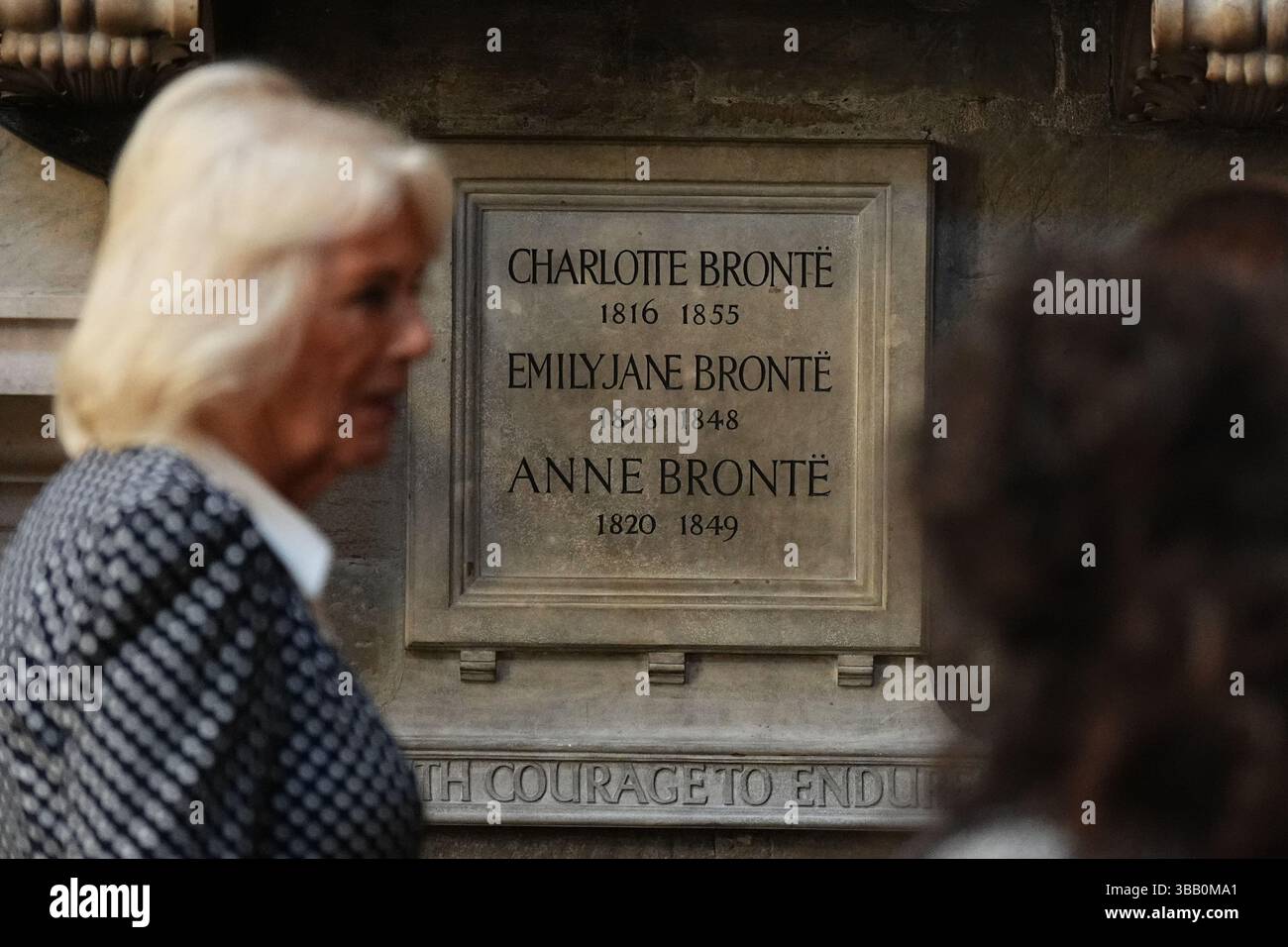 Queen Camilla passing the Bronte memorial in Poet's Corner at ...