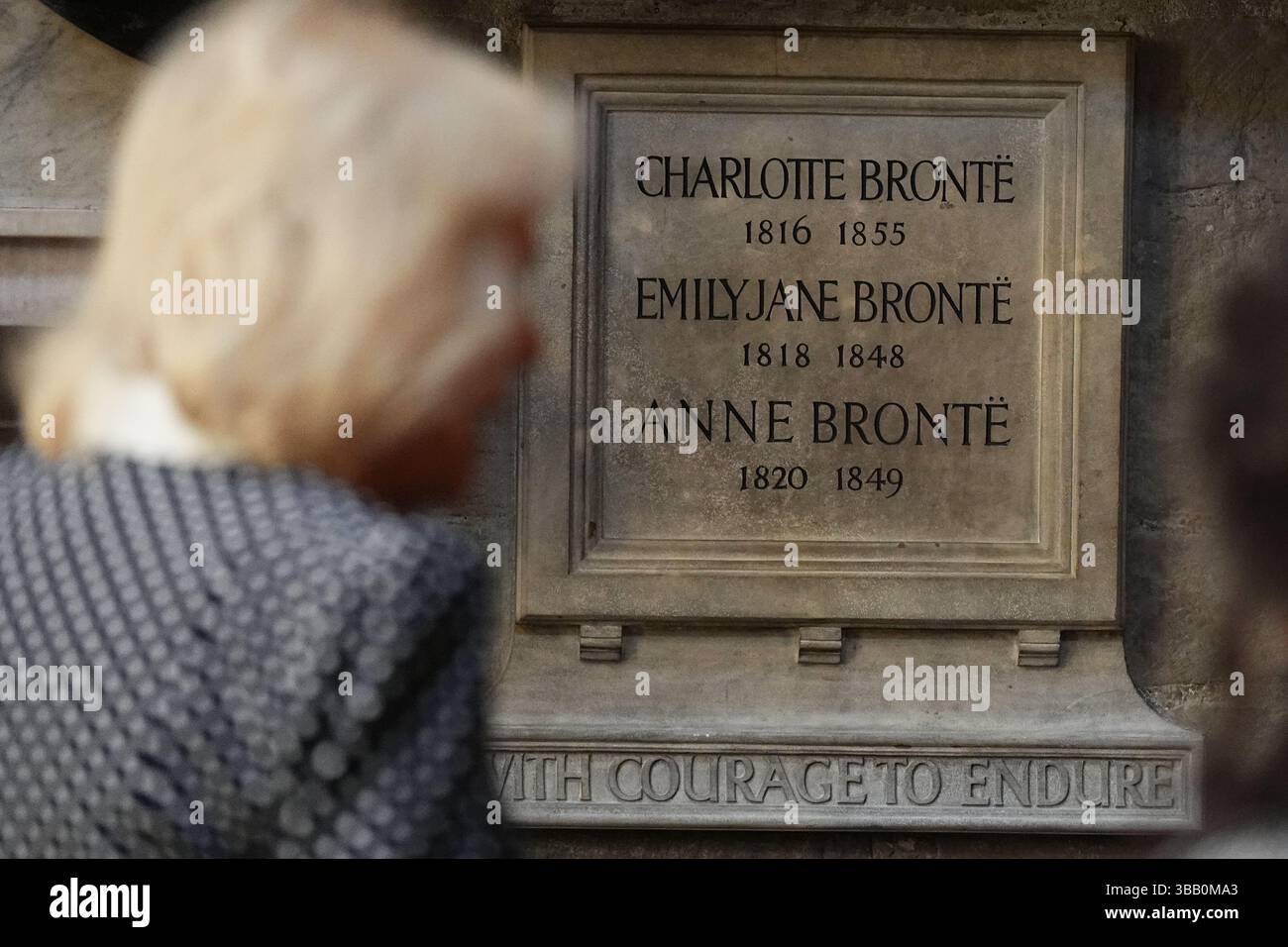 Queen Camilla passing the Bronte memorial in Poet's Corner at ...