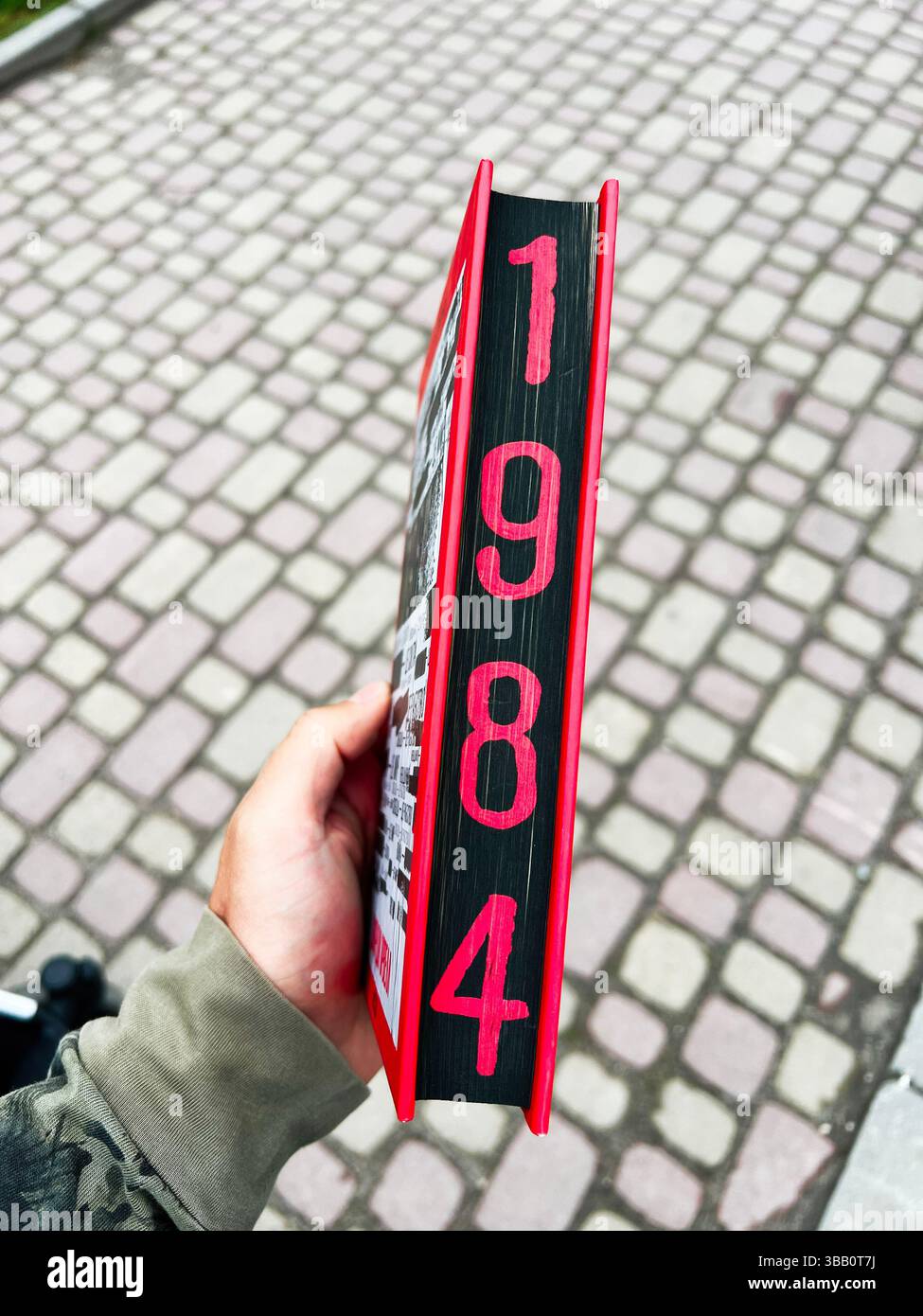 Kyiv, Ukraine - May 14, 2025: Side angle of George Orwell 1984 book ...