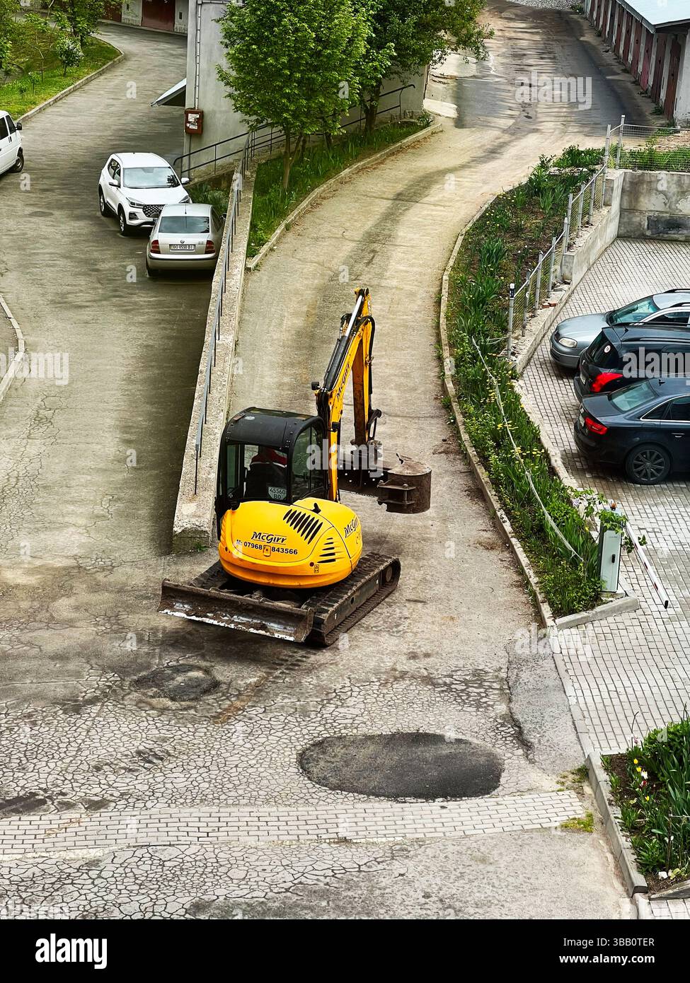 Kyiv, Ukraine - May 14, 2025: Excavator McGirr positioned on a concrete ...
